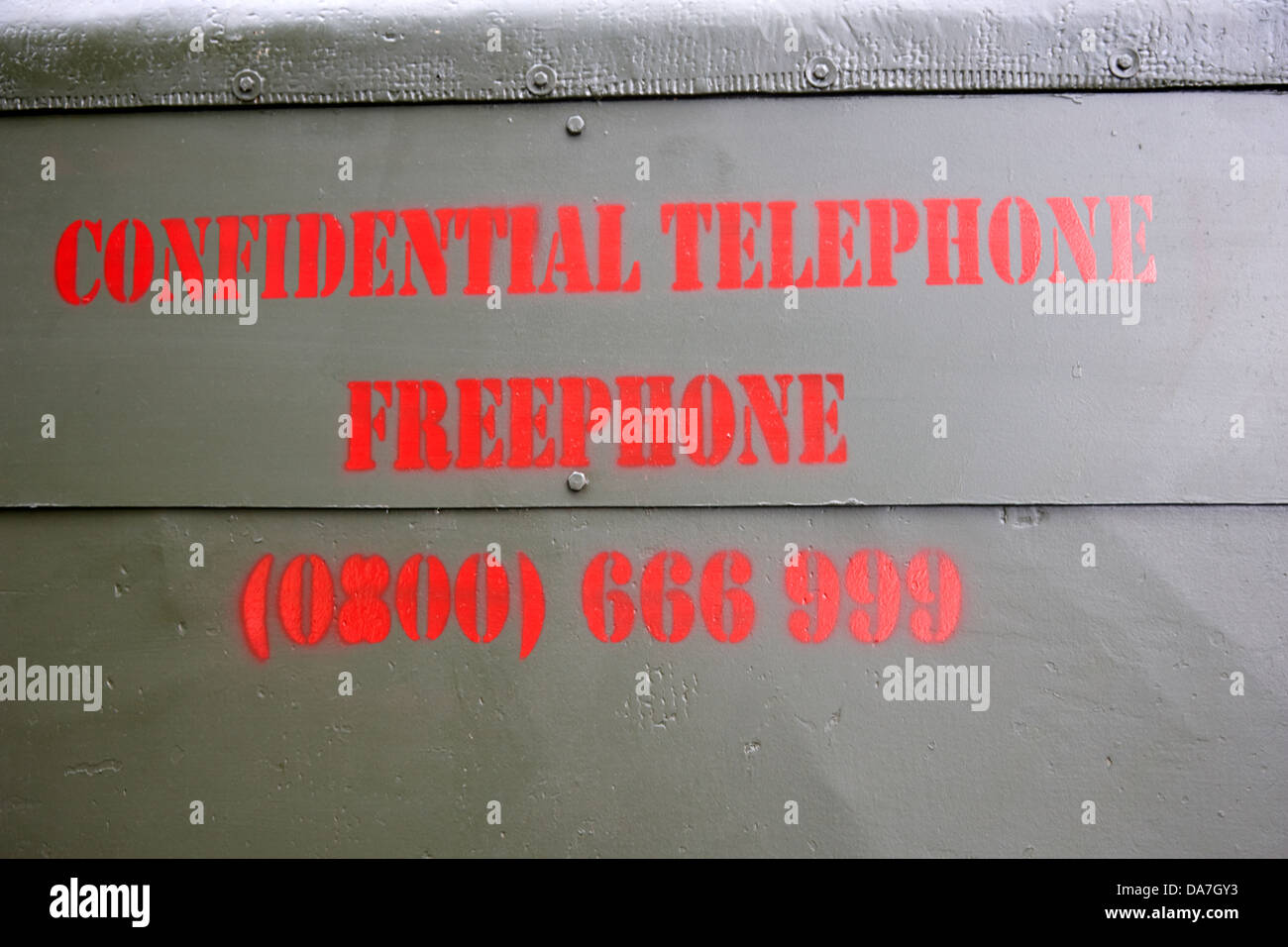 confidential telephone number painted on the side of a udr landrover ...