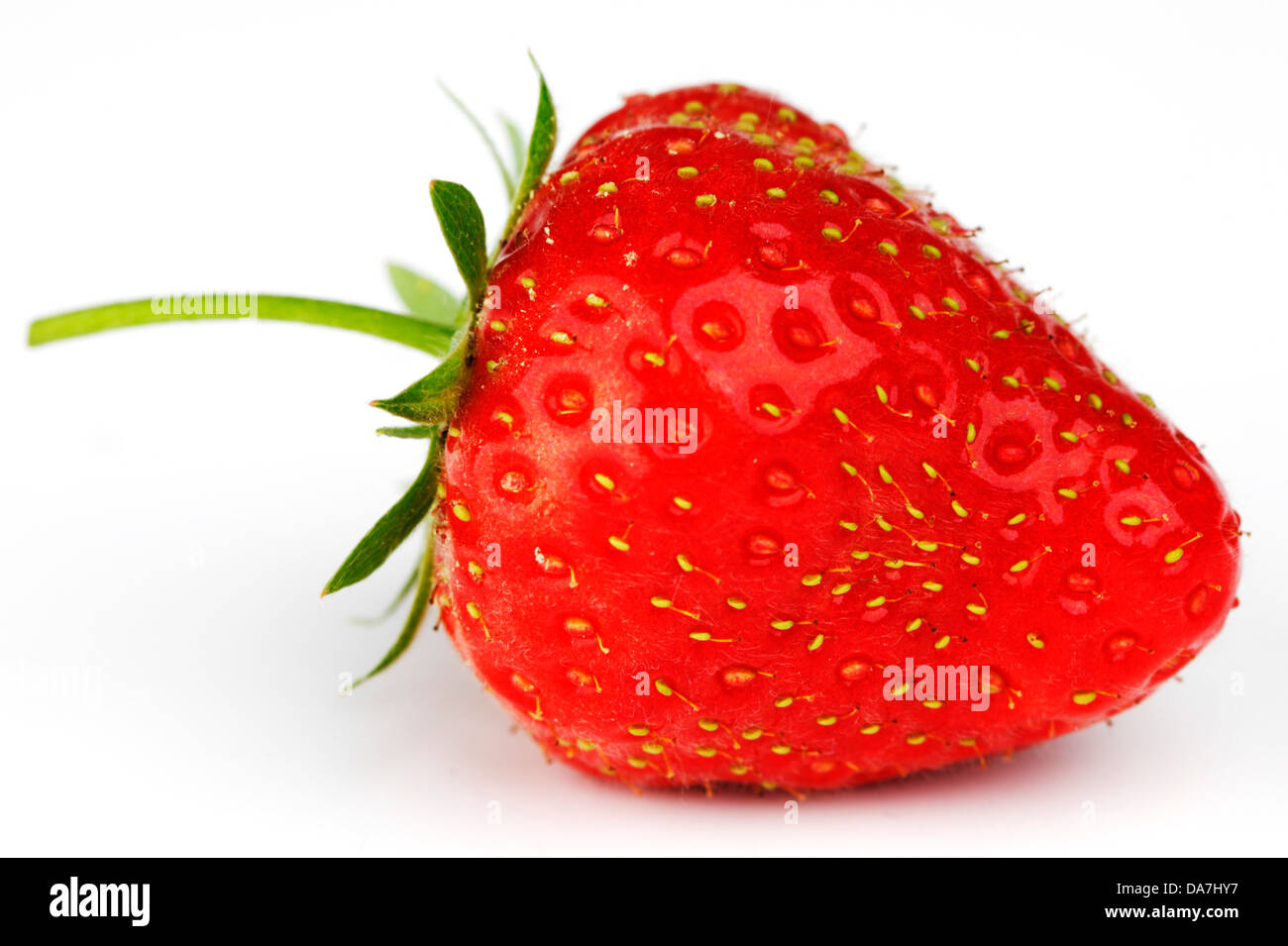 One strawberry isolated on white background Stock Photo - Alamy