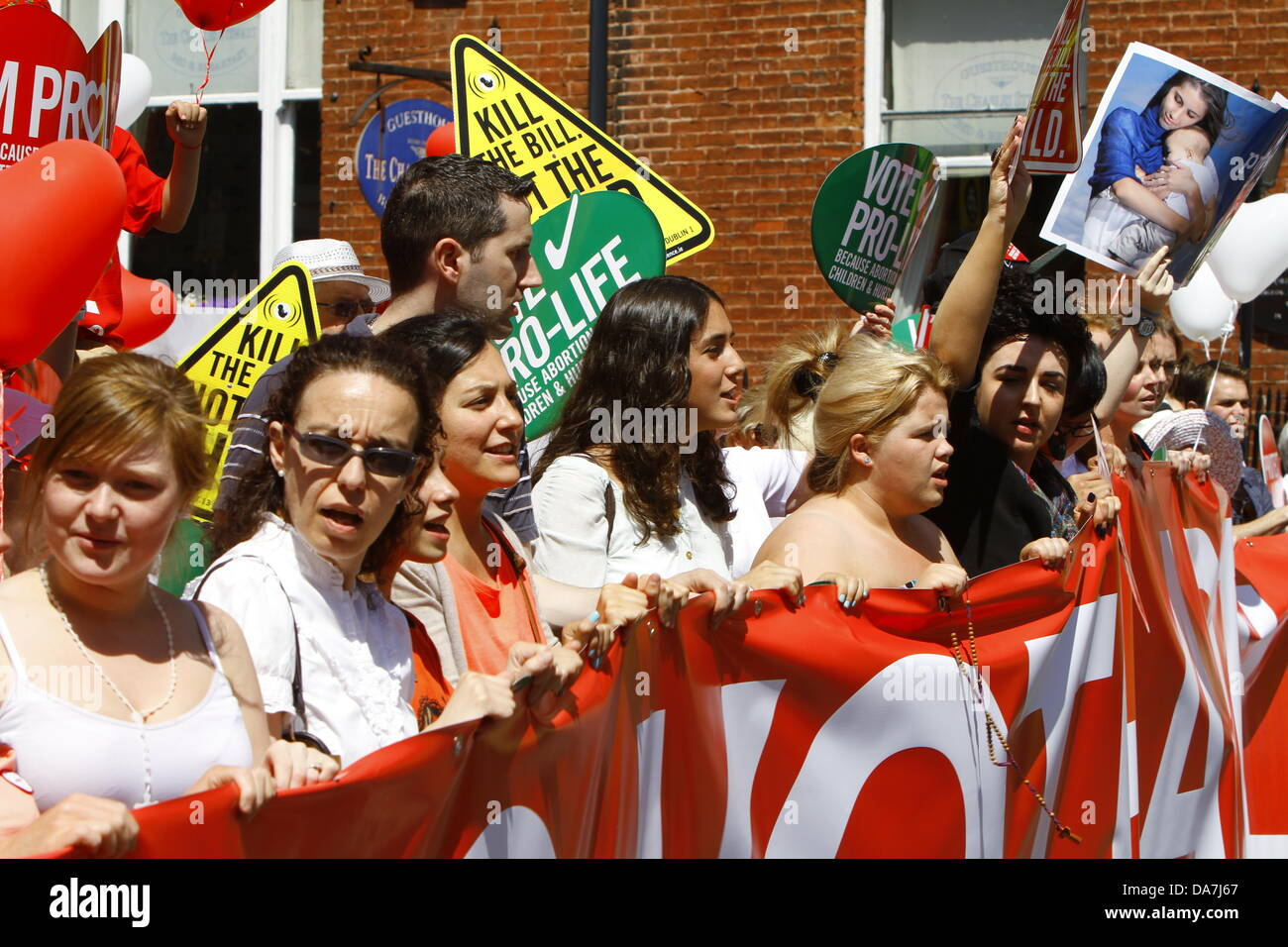 Dublin, Ireland. 6th July 2013. Pro-life activists are pictured behind ...