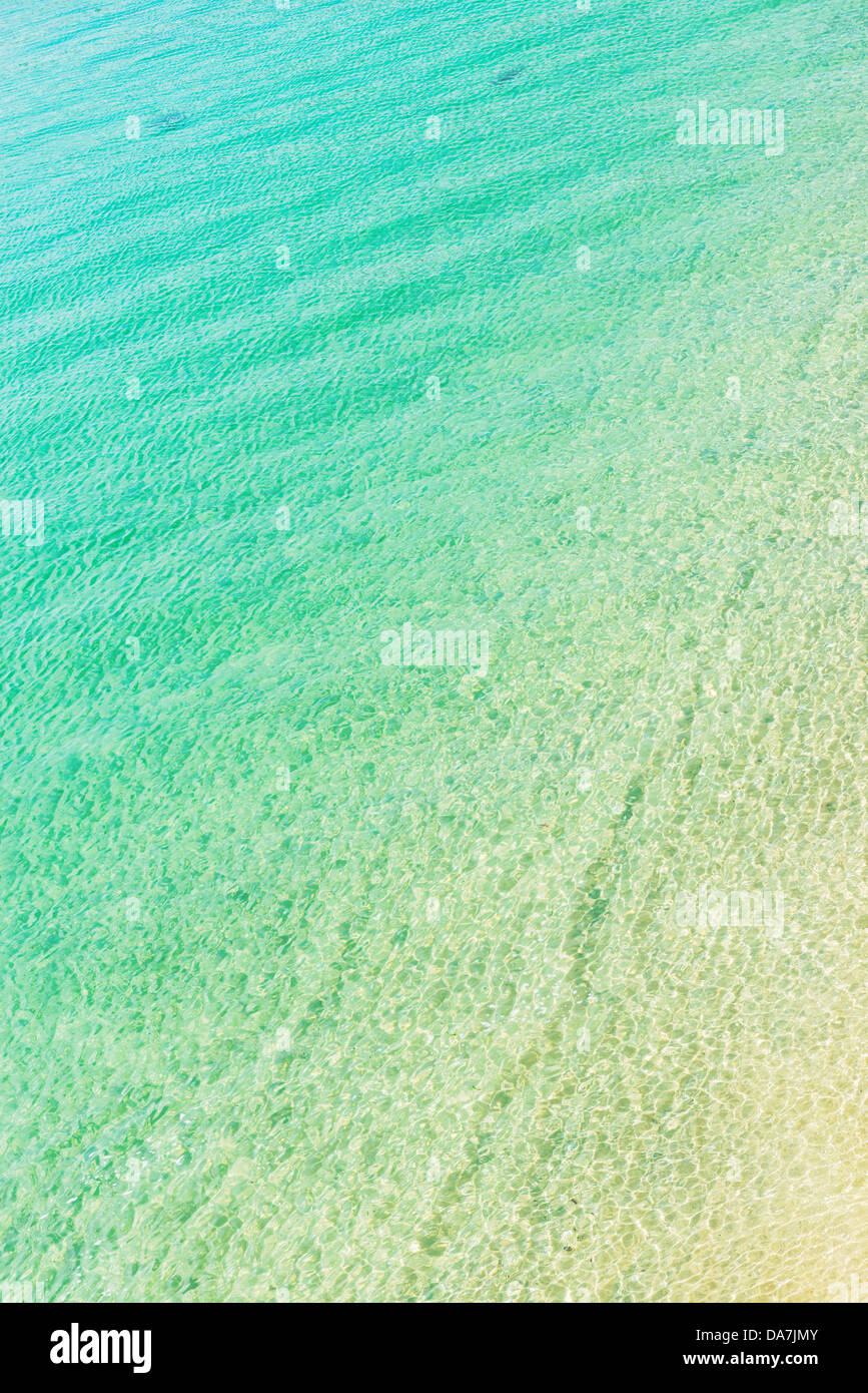 Vertical of the Clear shallow Blue/green sea off the coast of St. Ives ...