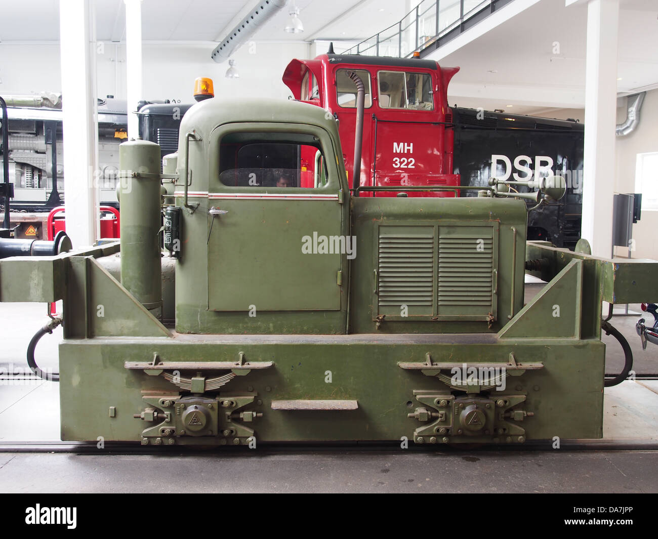 This 1954 image features a shunting engine manufactured by Pedershaab ...