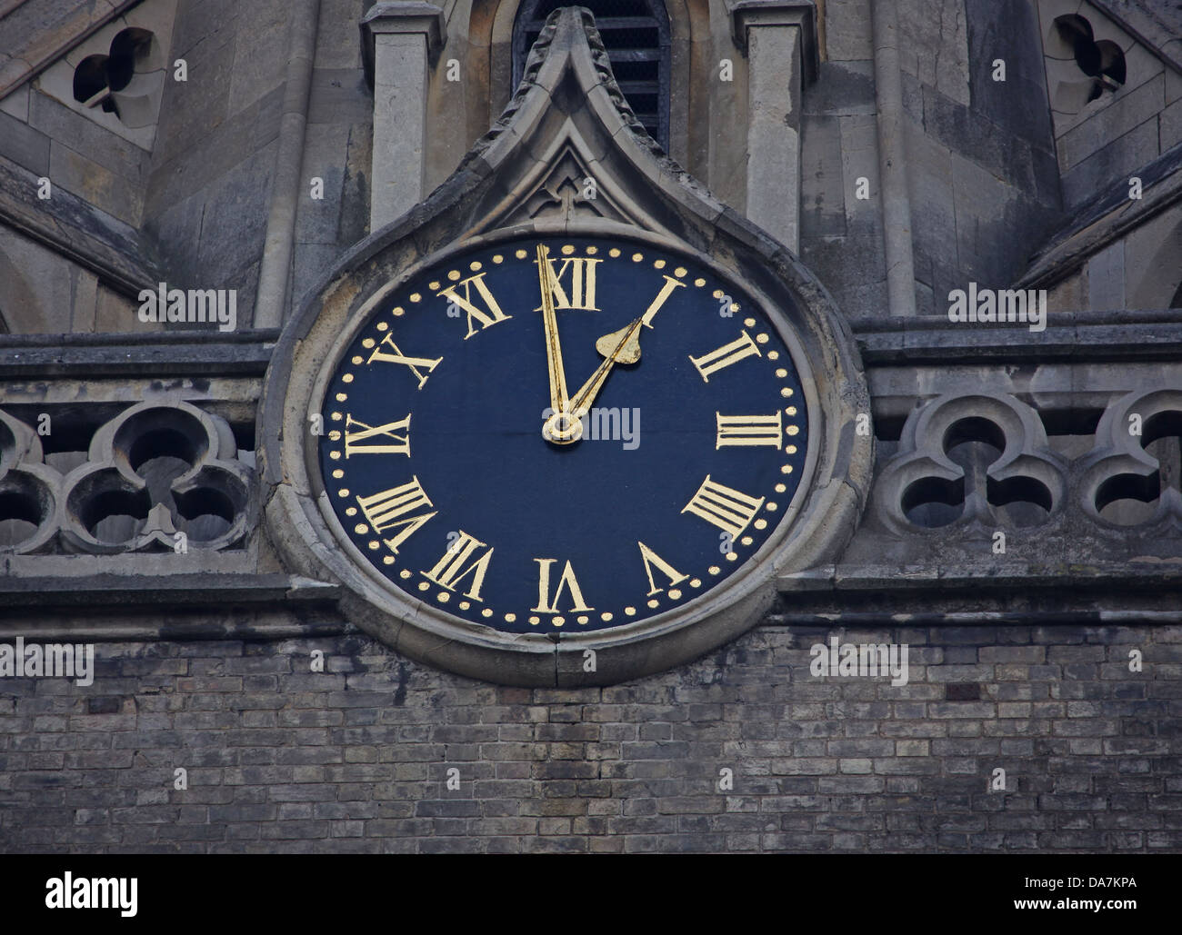large well maintained Church Clock with black face and Gold hands ...