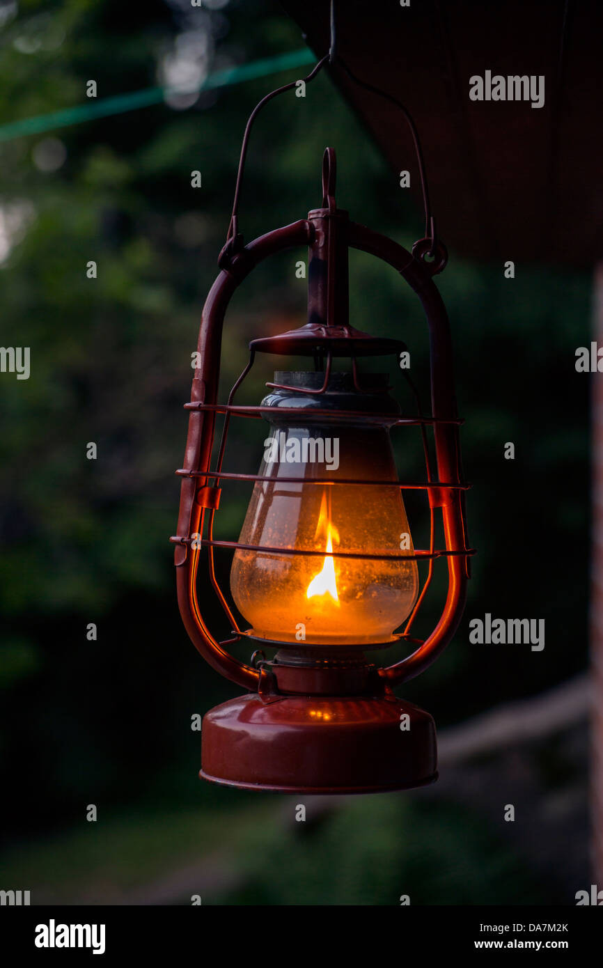 Old fashioned latern burning flame thanks kerosene fuel Stock Photo - Alamy