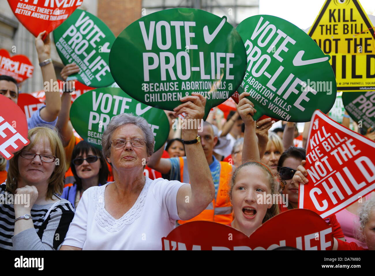 Dublin, Ireland. 6th July 2013. People hold up pro-life signs ...