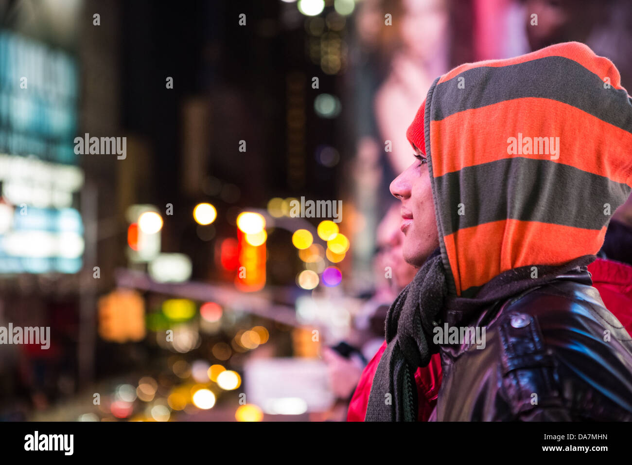 Profile Portrait of a Times Square tourist with the city lights in the ...