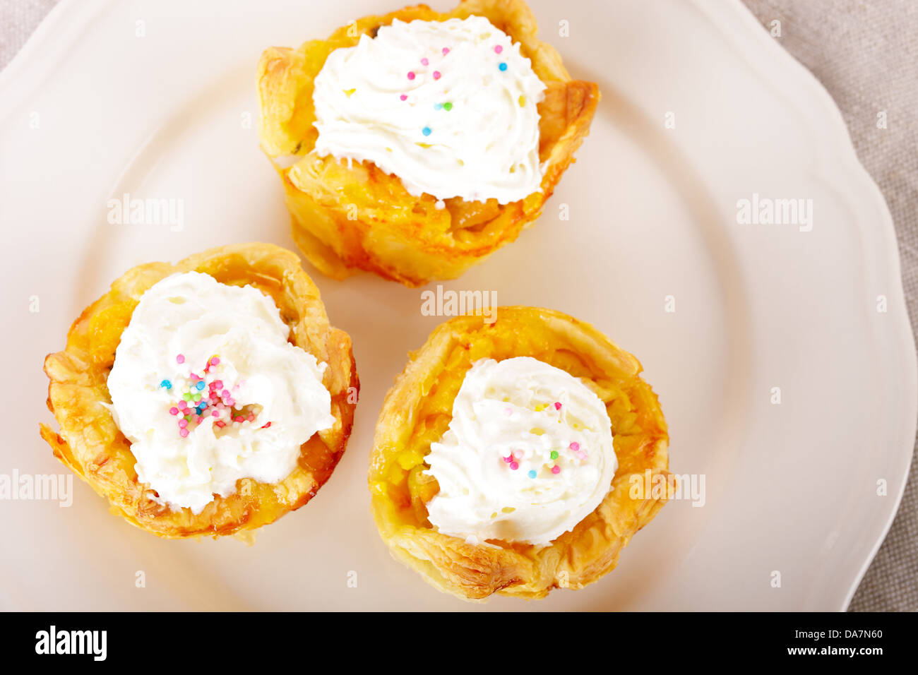 Small cakes with cream Stock Photo - Alamy