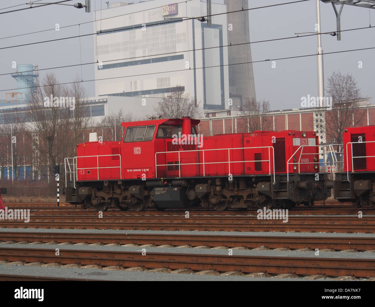 This image captures a Dutch freight train identified by the ...