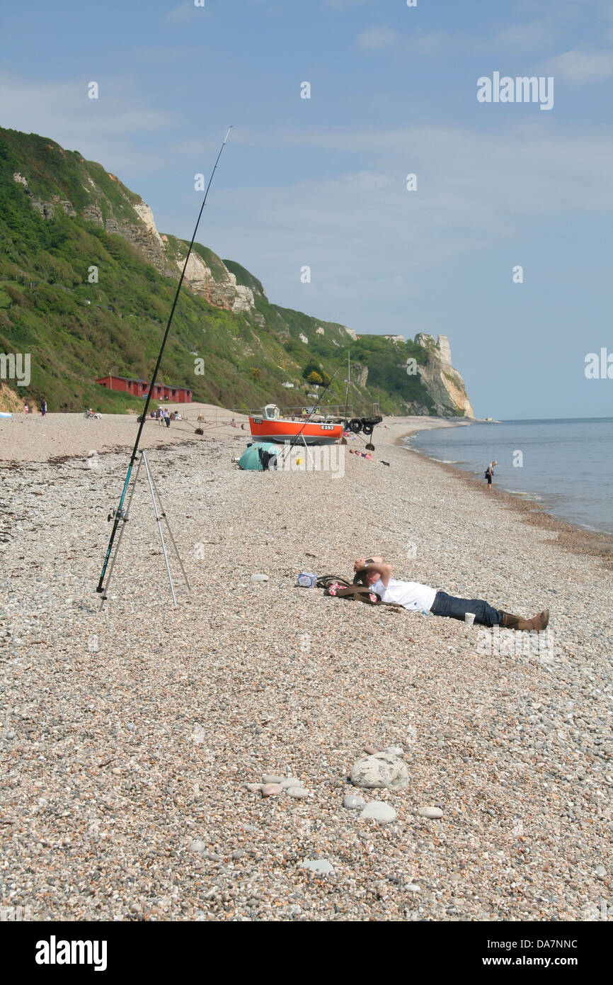 shingle beach and cliffs Branscombe Mouth Devon England UK Stock Photo ...