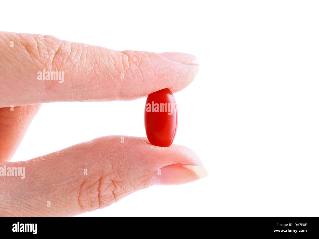 Hand and pill isolated on white background Stock Photo - Alamy