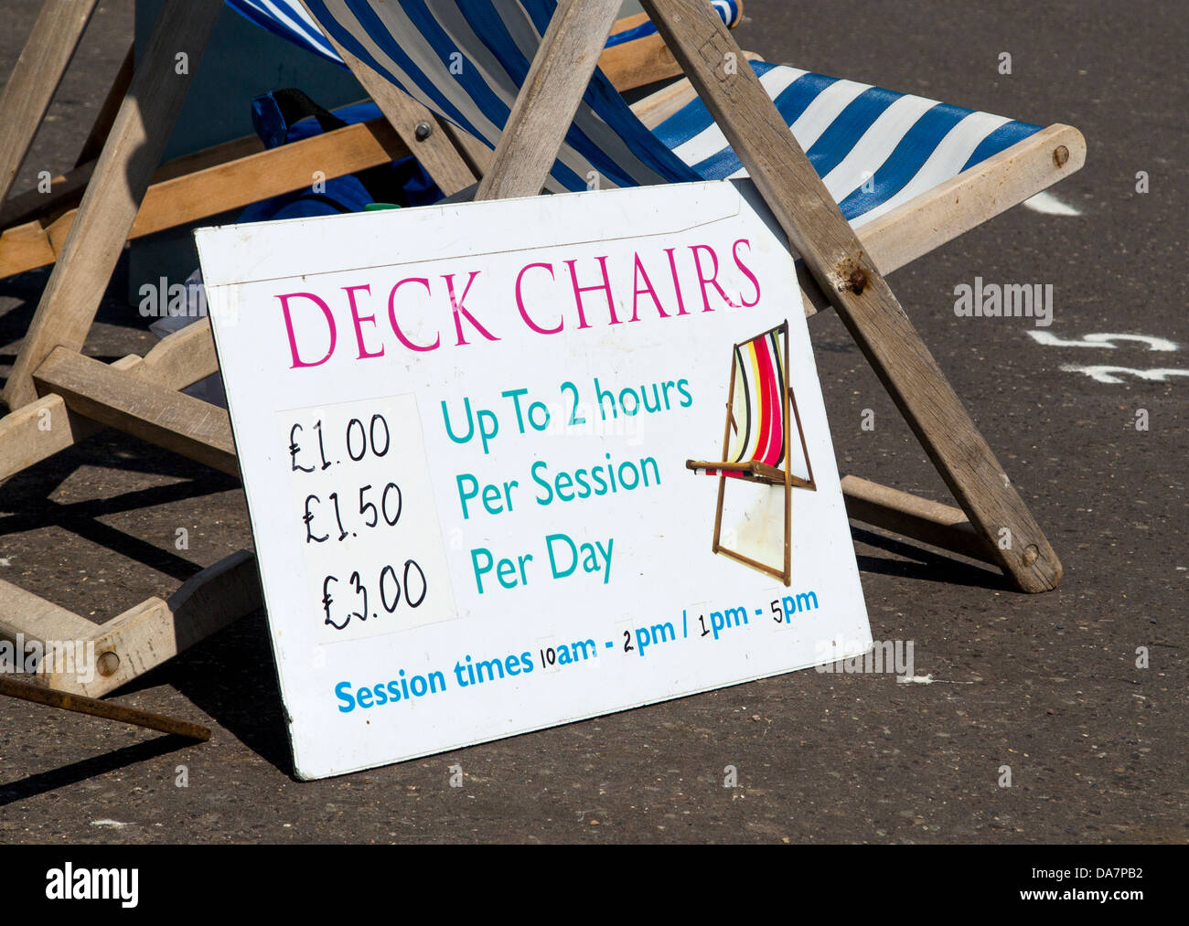 Deck chair hire sign in Sidmouth, Devon, England Stock Photo - Alamy