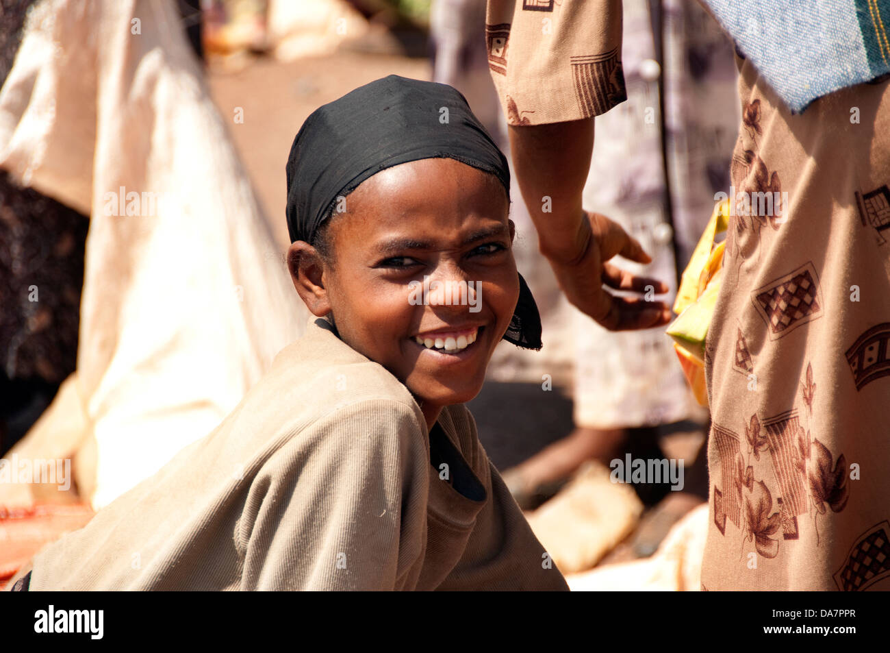 Smiling girl with a black kerchief, Waliso market, Ethiopia Stock Photo ...