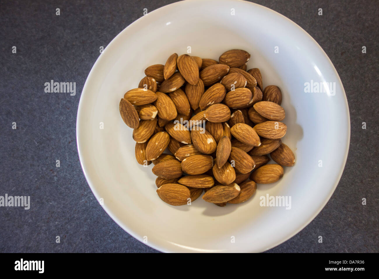 Almonds bowl hi-res stock photography and images - Alamy