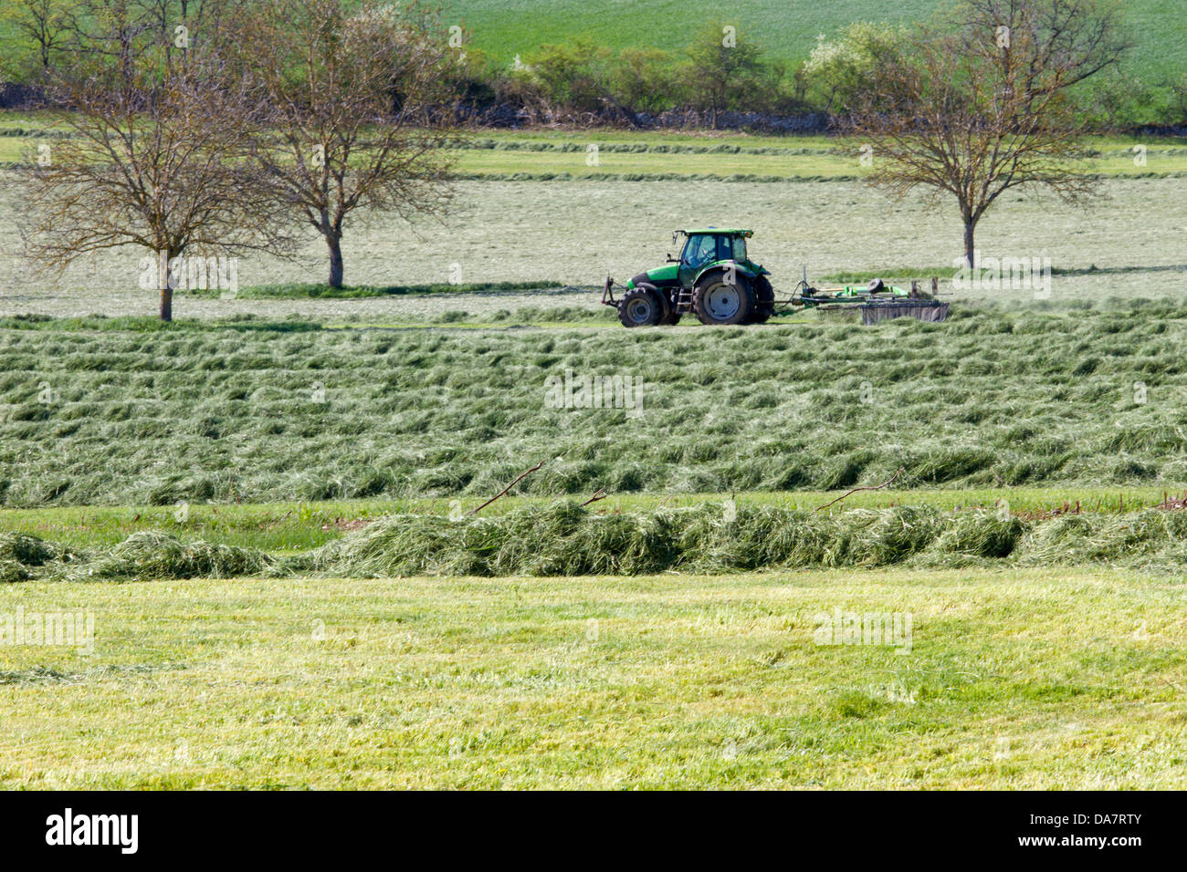 Harvest hay tractor hi-res stock photography and images - Alamy