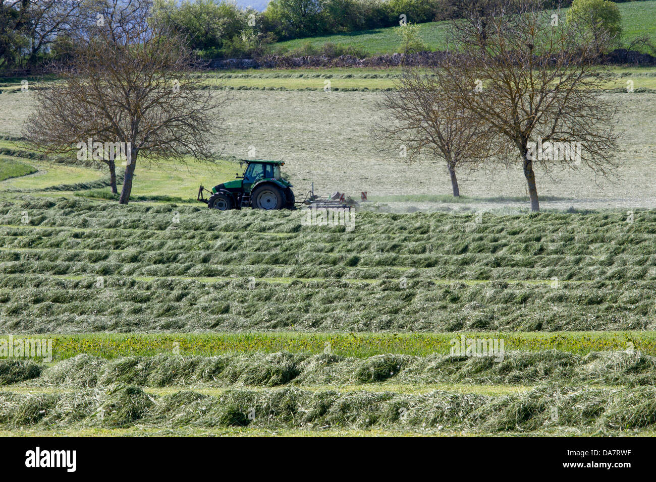 Harvest hay tractor hi-res stock photography and images - Alamy