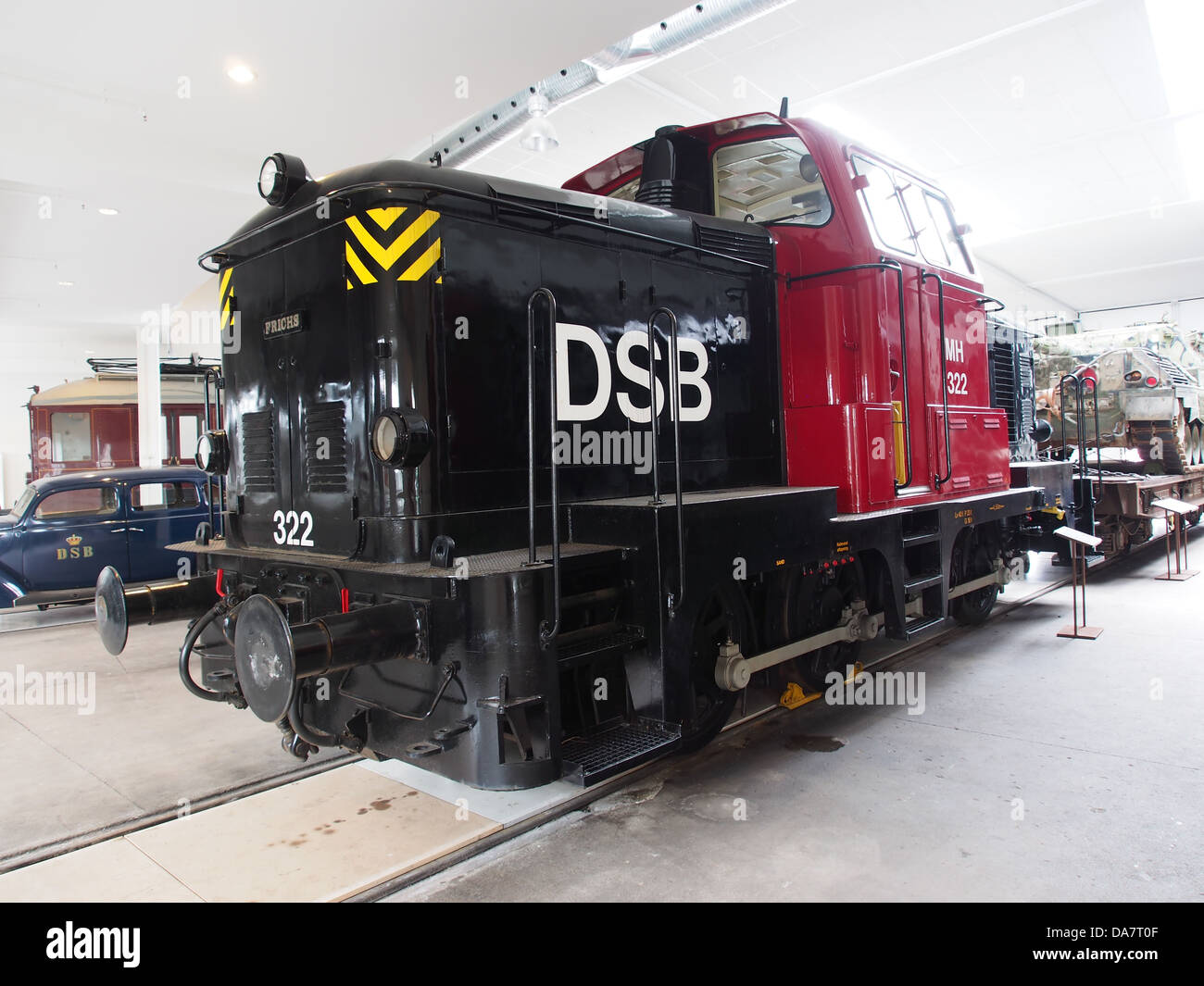 This image depicts the DSB locomotive MH 322, a classic Danish ...