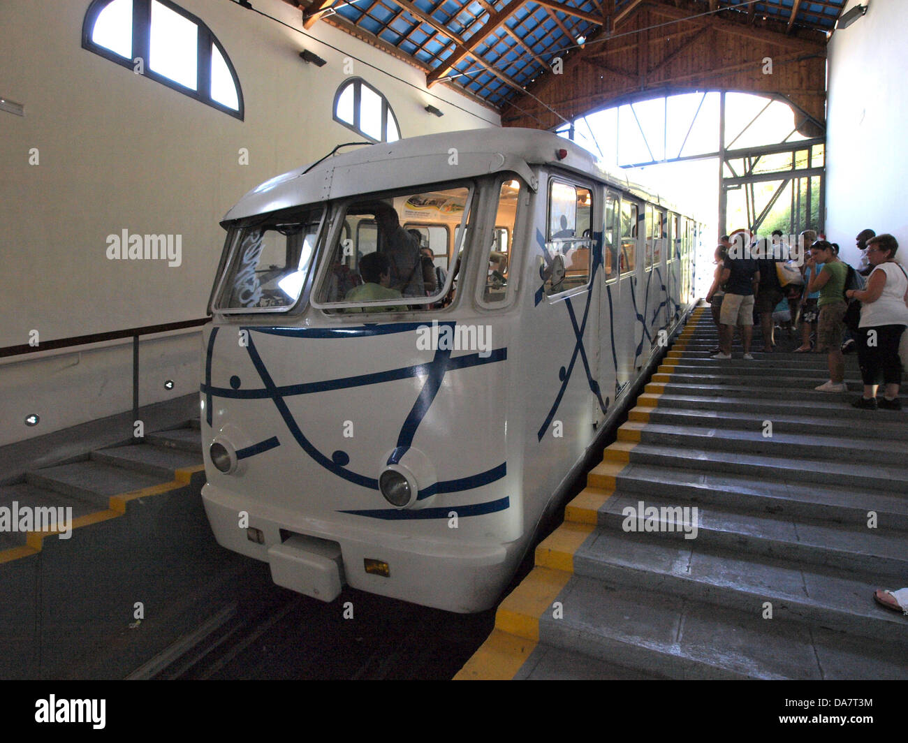 This image depicts a funicular in Barcelona, a popular mode of ...
