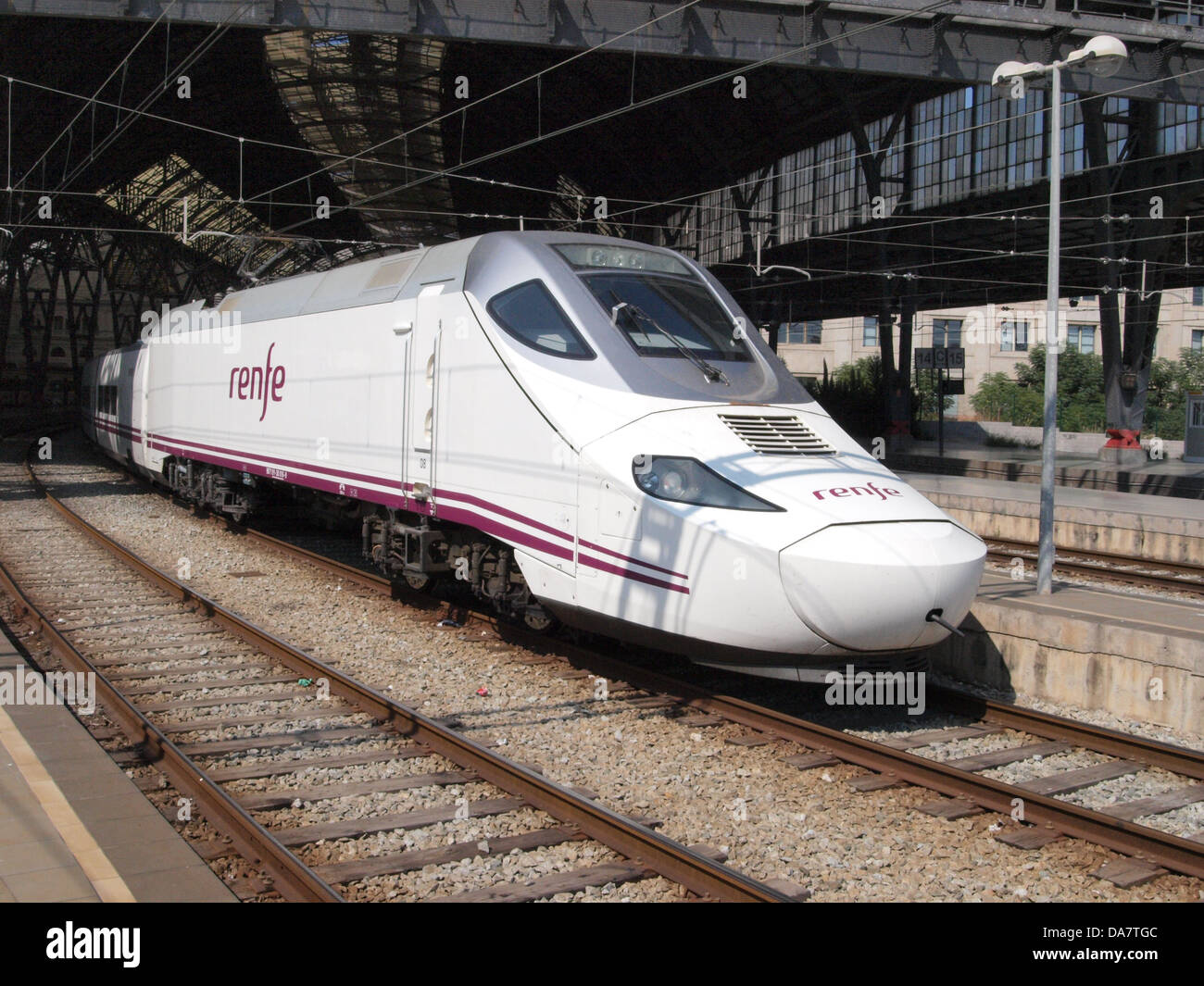 This image features the Renfe high-speed train 9671 at Barcelona ...