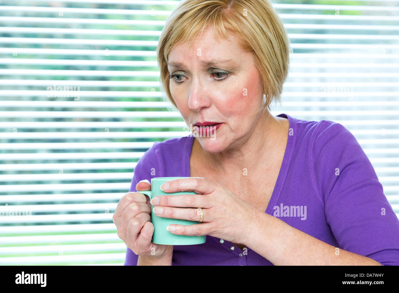 woman looking worried and concerned Stock Photo - Alamy