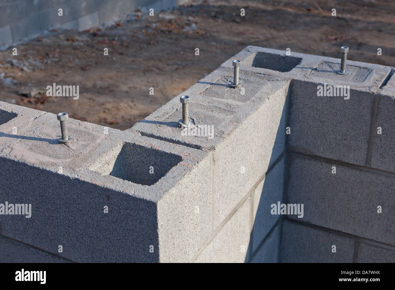 Bolts in concrete block on a new home construction Stock Photo - Alamy