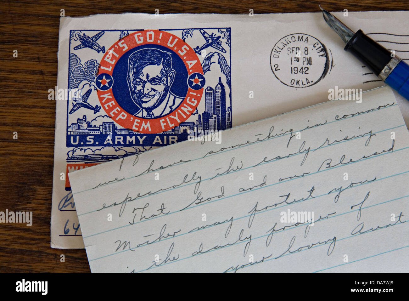 World War II 1942 letter with envelope and fountain pen laying on oak ...