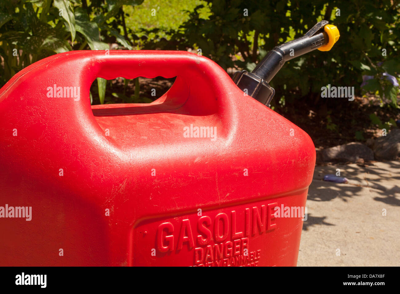 A red five gallon fuel jug Stock Photo - Alamy