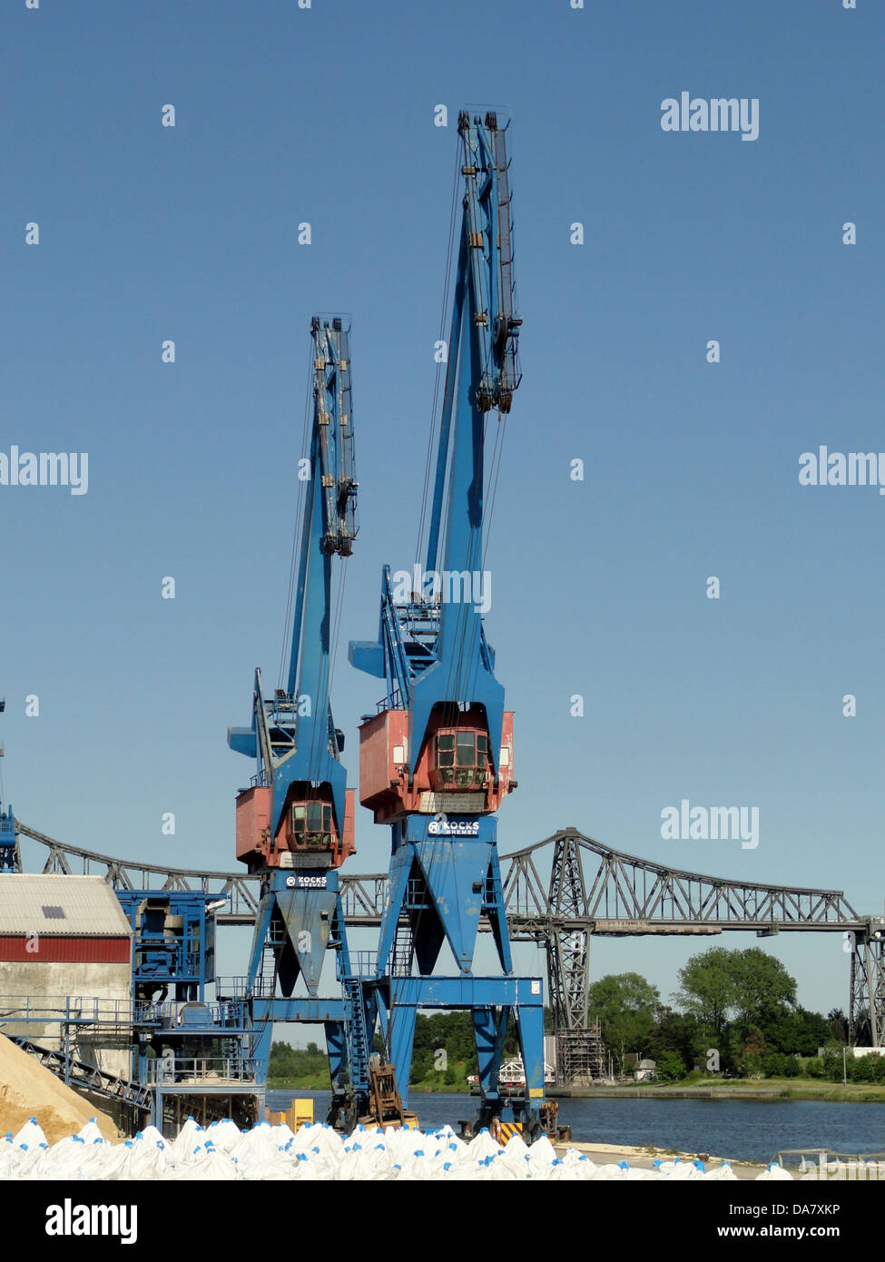 This image shows the large cranes at the Rendsburg Harbor, capturing ...