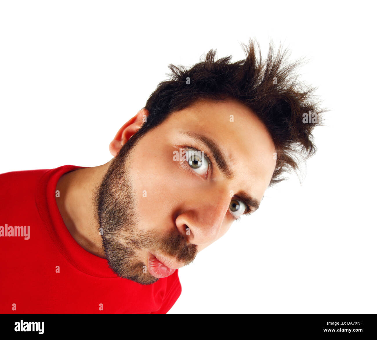 Young boy with a surprised expression on white background Stock Photo ...