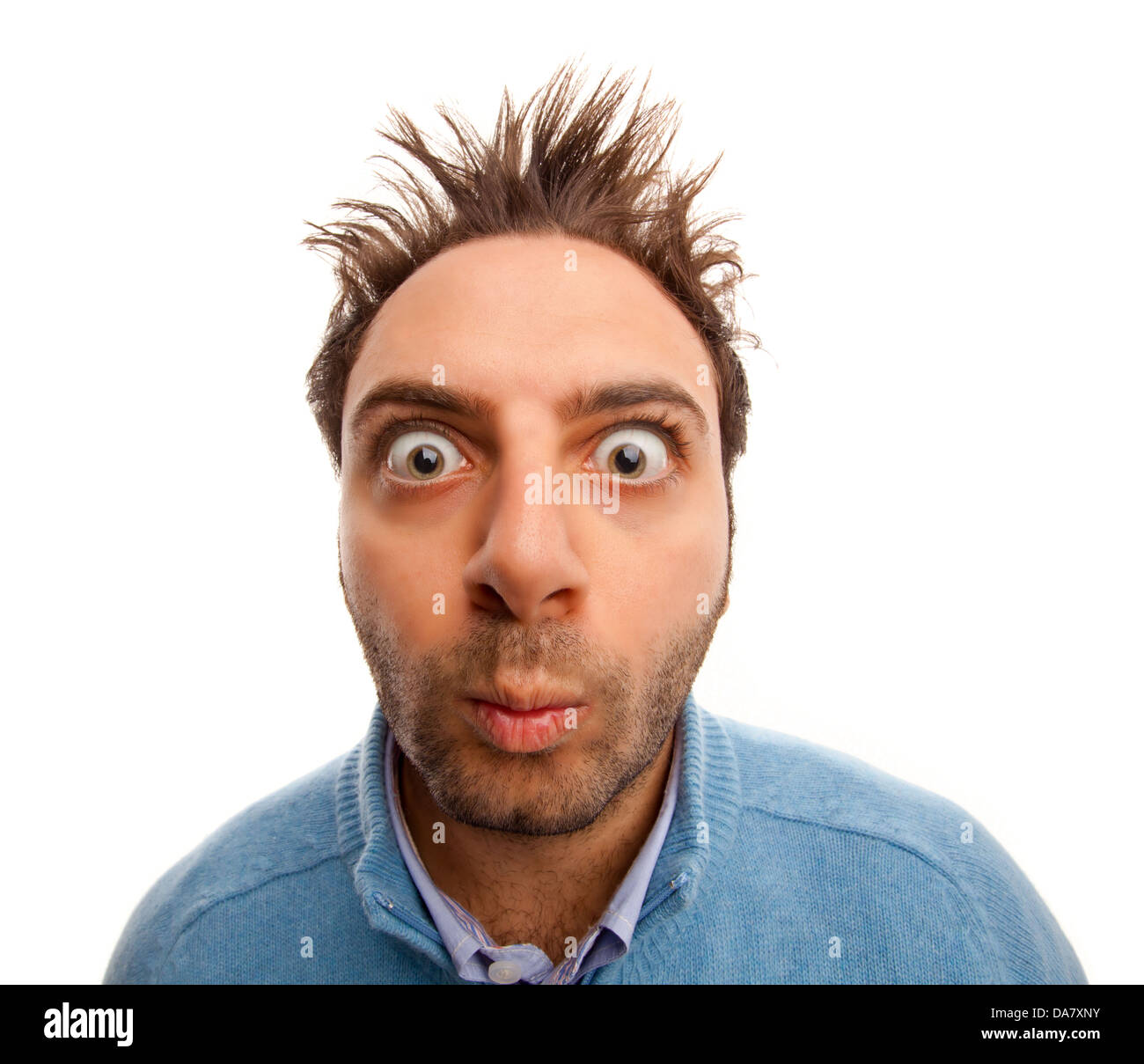Young boy with a surprised expression on white background Stock Photo ...