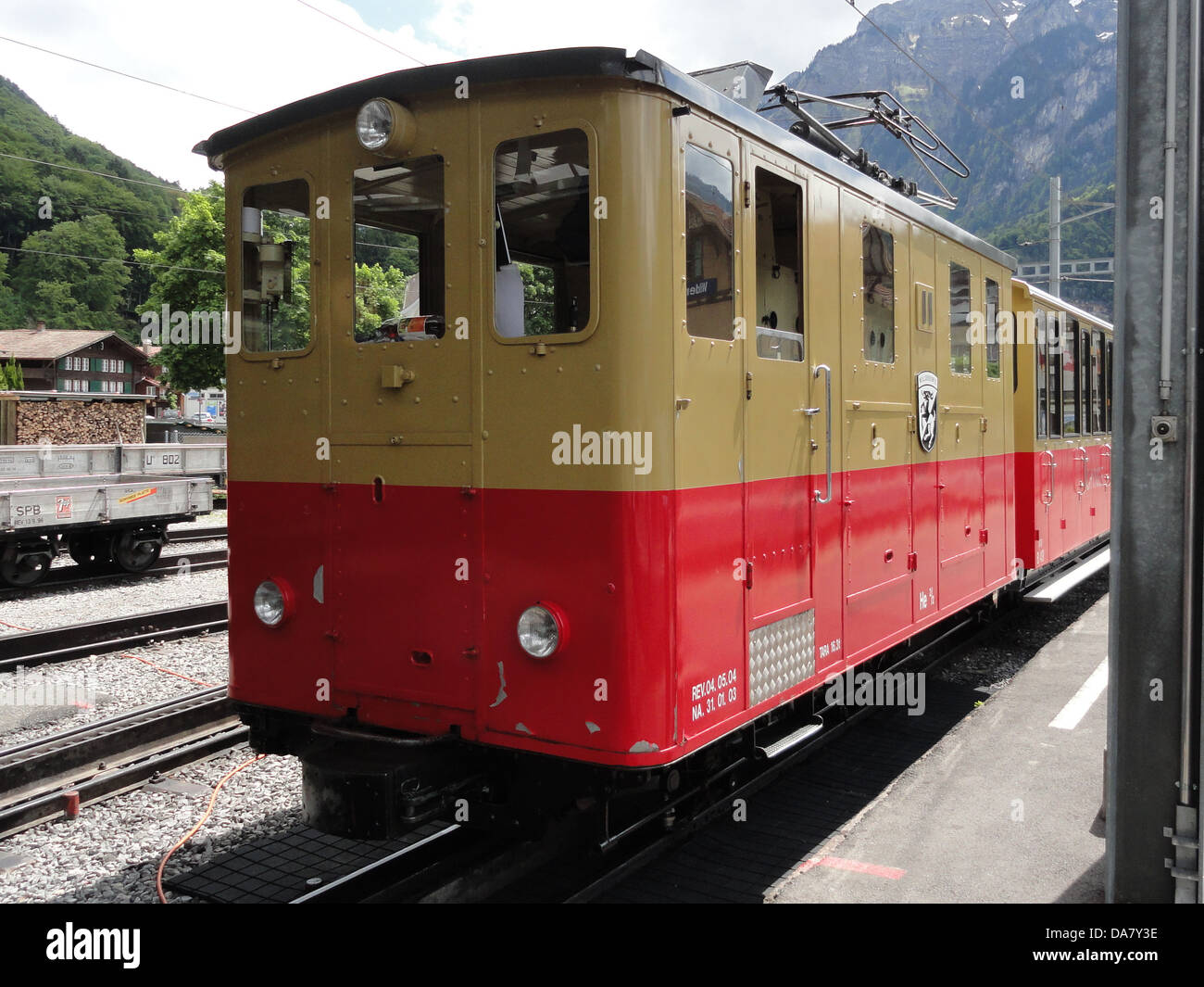 The image features a locomotive built by Schweizerische Lokomotiv ...