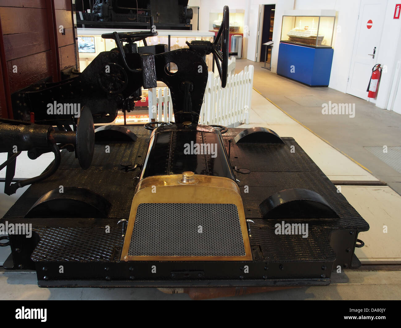 This historical photograph showcases a black shunter locomotive, one of ...