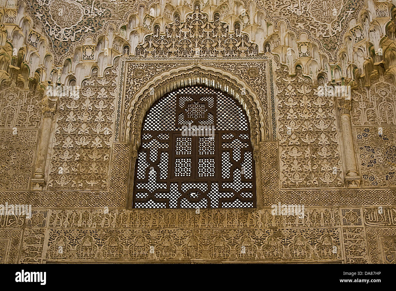 Ornate reliefs ,morish window ,interior Nasrid Palace,Alhambra,Granada ...