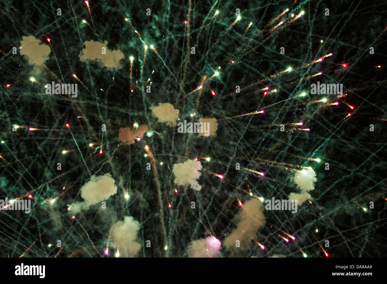 Brightly exploding fireworks lighting hi-res stock photography and ...