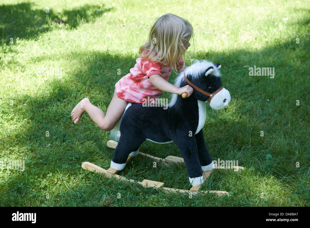 Child rocking horse hi-res stock photography and images - Alamy
