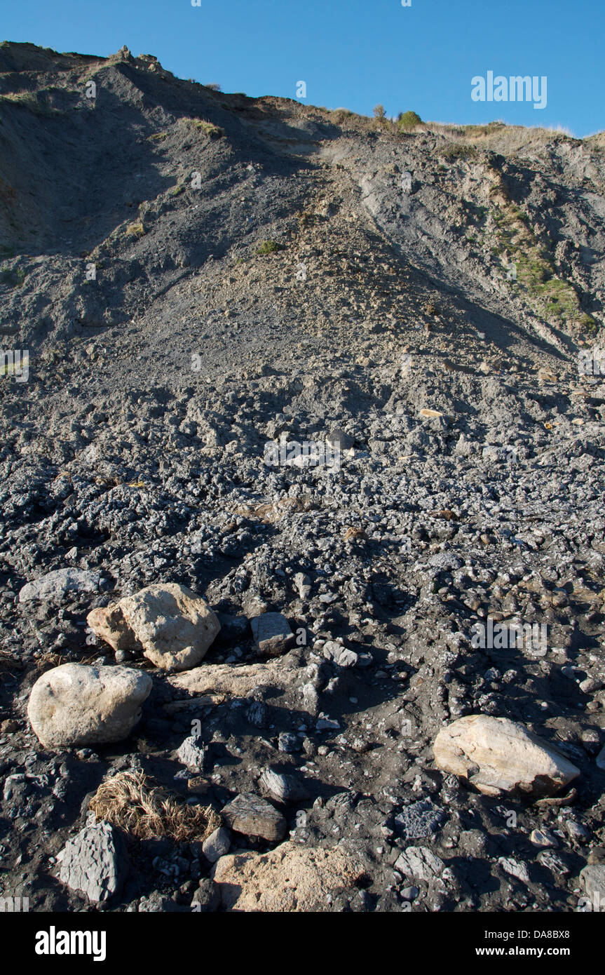 A scree of mudslide debris from a collapsed cliff at Black Head near ...