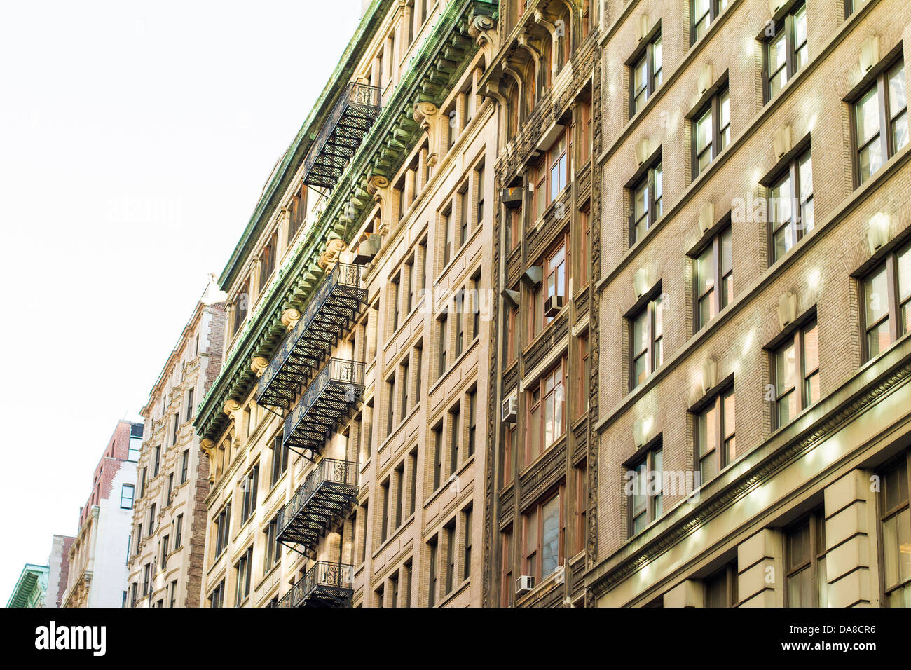 Building fire escape ladders new york city ny hi-res stock photography ...