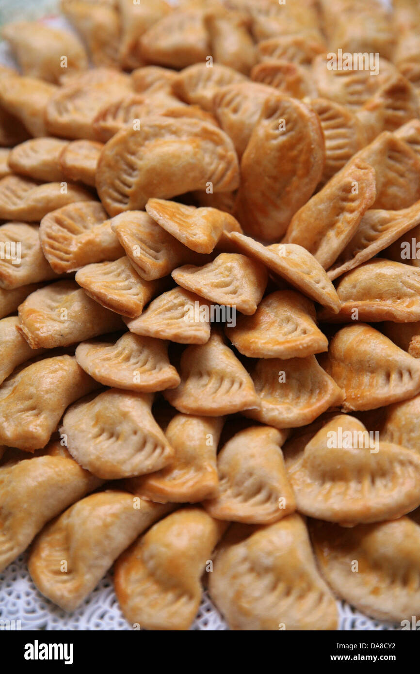 Empanadas served in a catering food service tray Stock Photo - Alamy