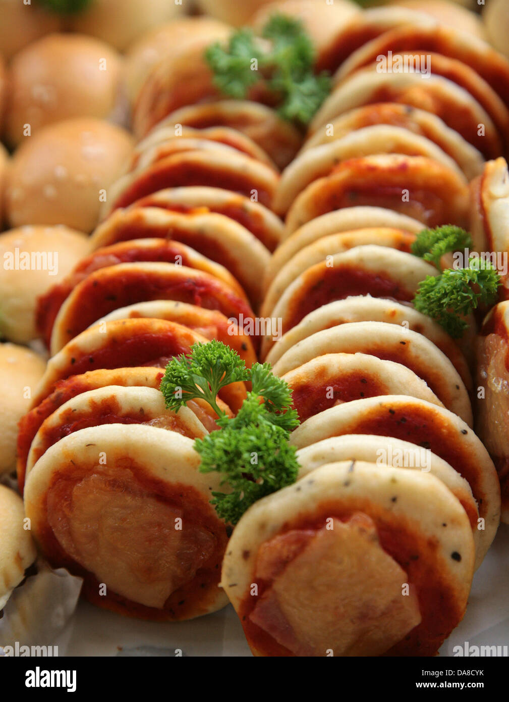 Mini pepperoni pizzas Stock Photo - Alamy