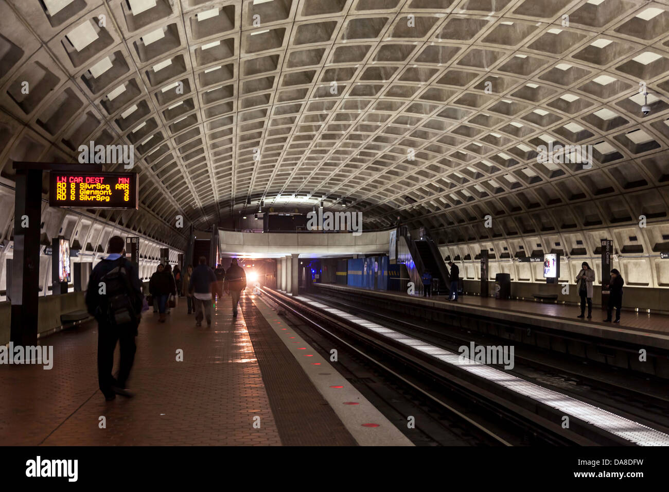 Metro subway train passing through an underground Metro station in ...