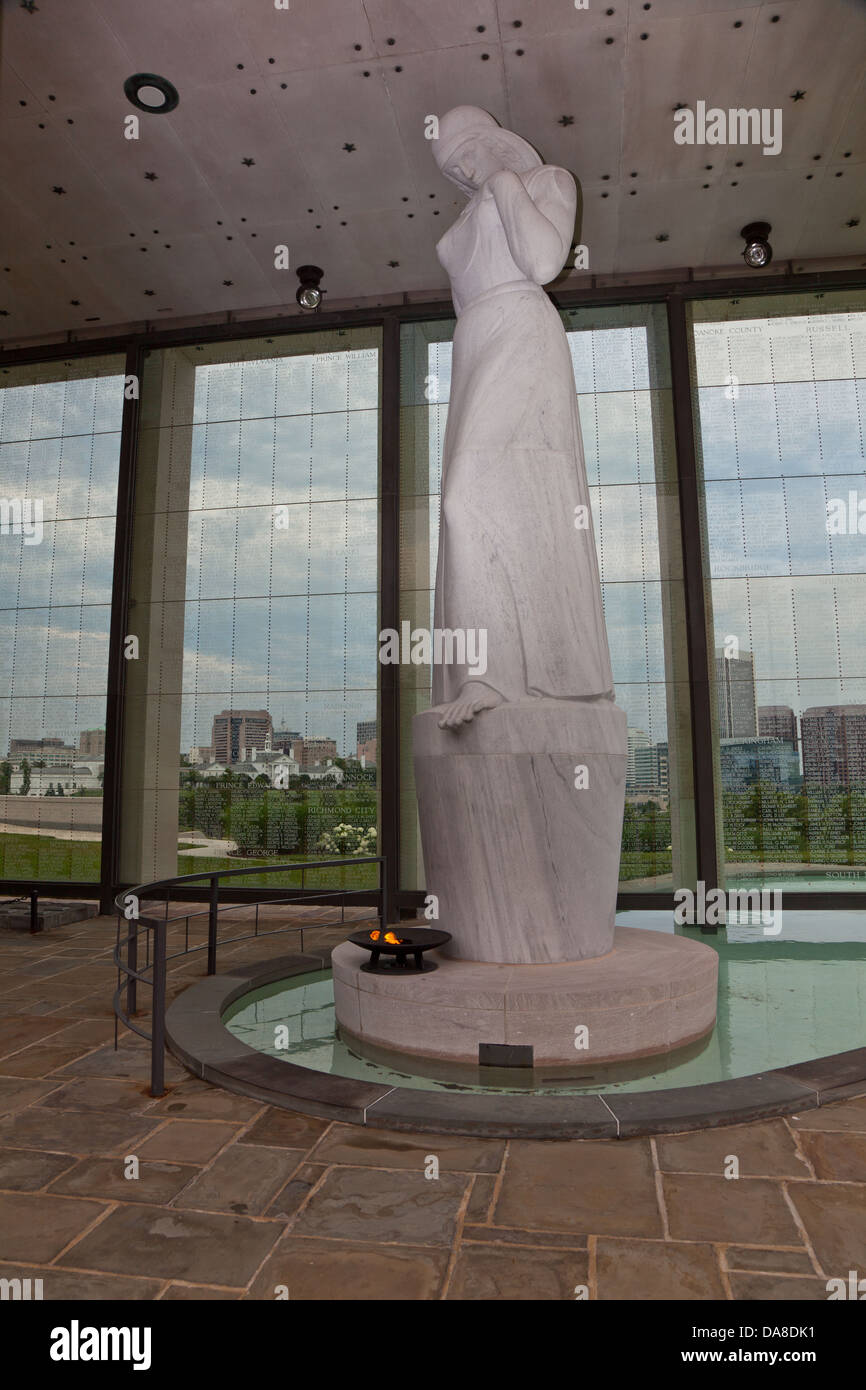 Statue of Memory in front of windows with names of Virginia residents ...