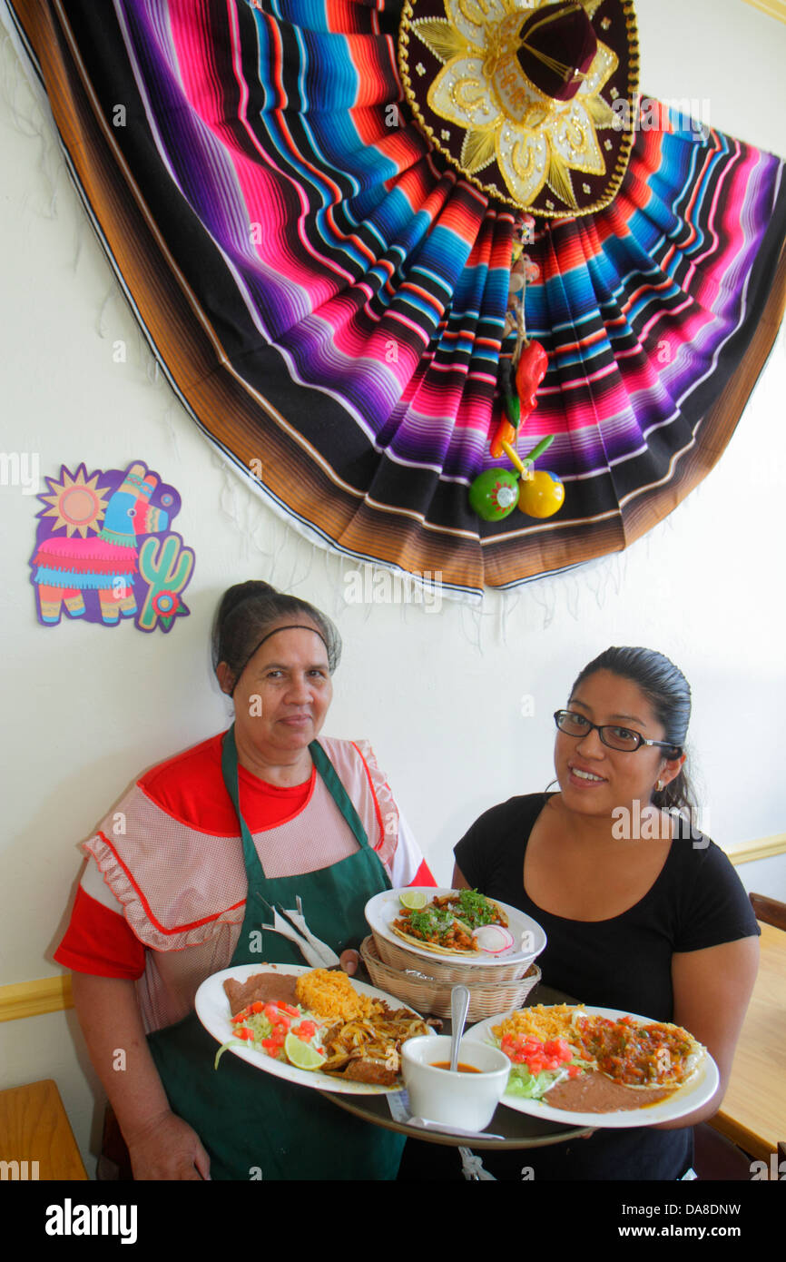 Waitress Serving Mexican Food