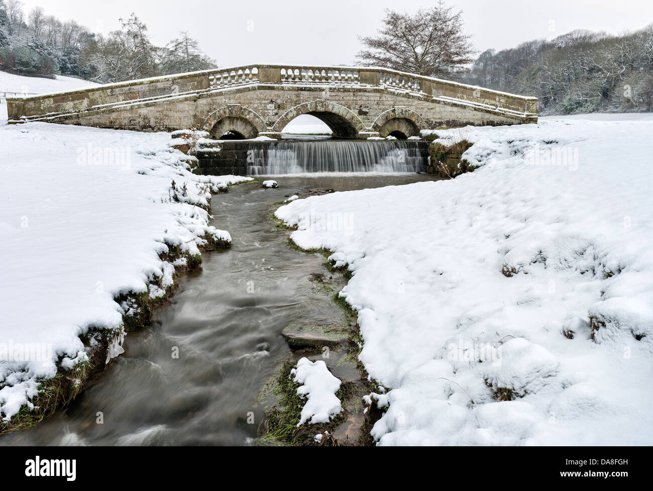 The bridge over Marrs Beck at Hovingham village, near Malton Stock ...