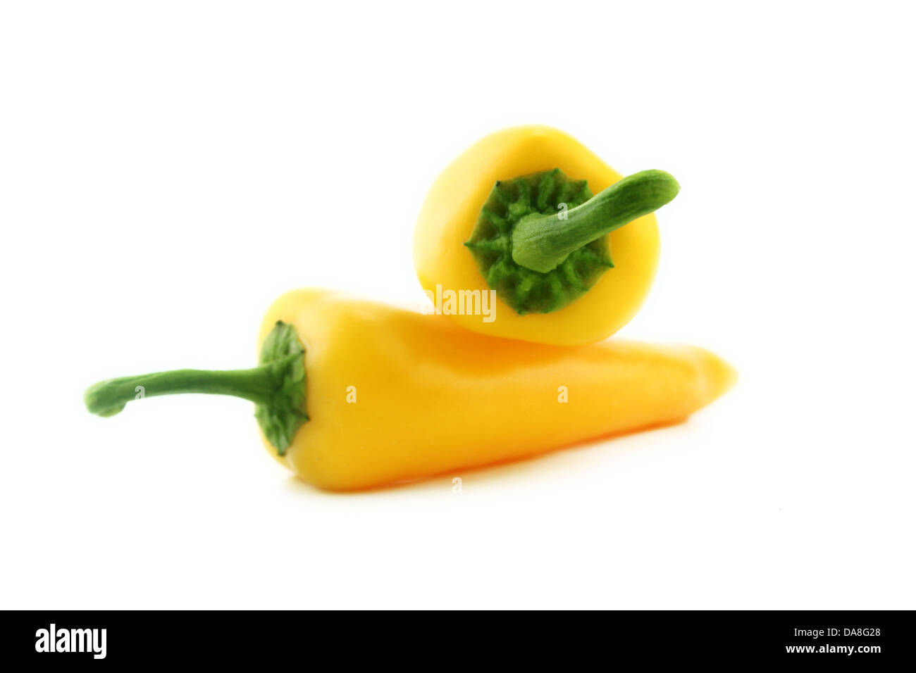 Yellow chili pepper on a white background Stock Photo - Alamy