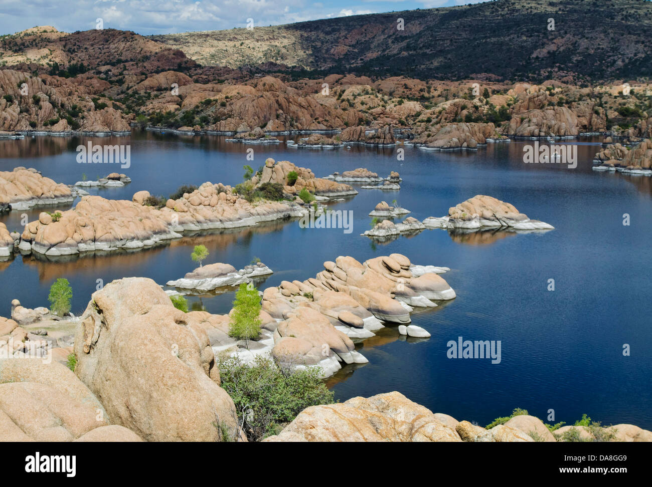 The unique red rock formations and deep blue water of Watson Lake ...