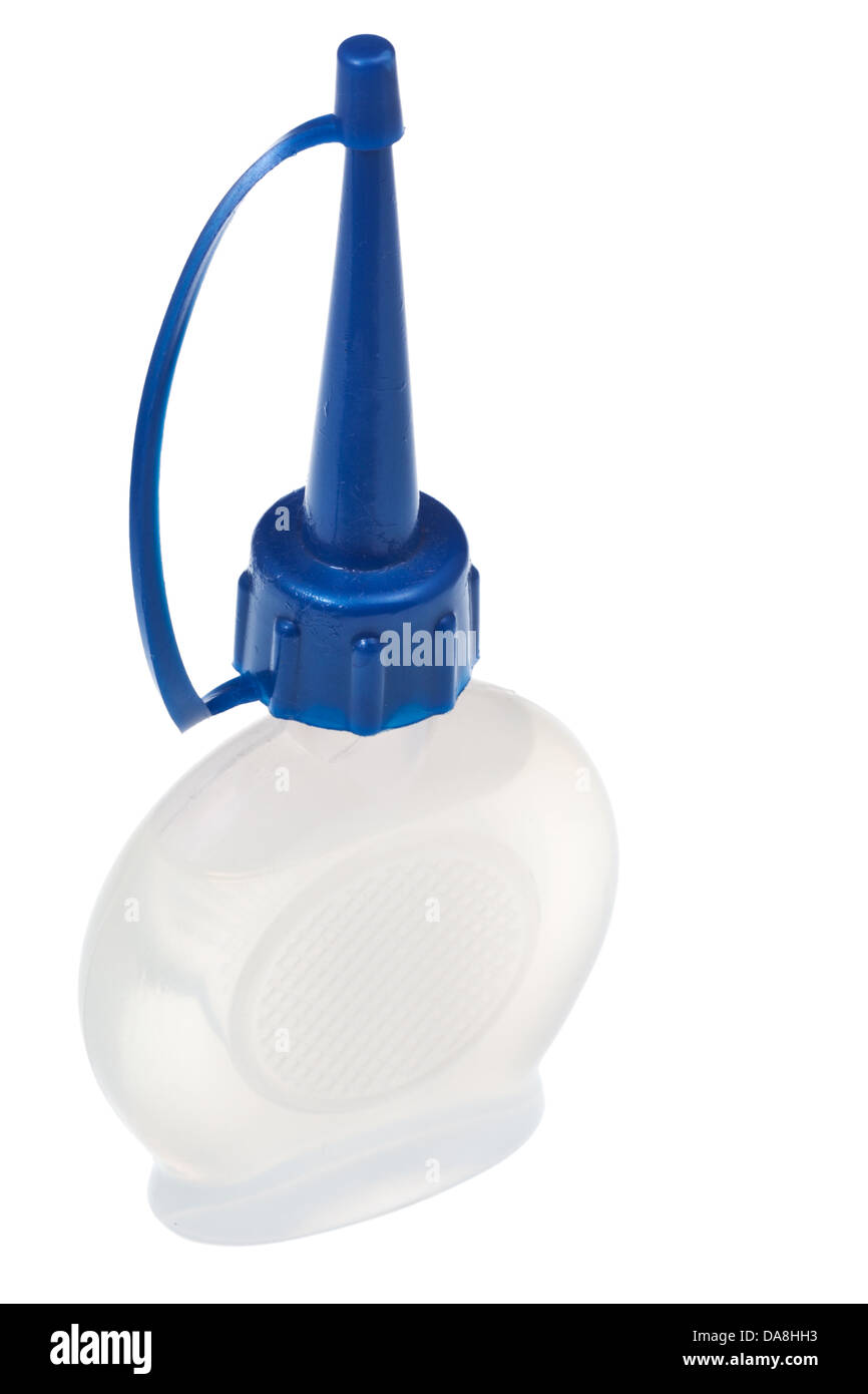 small plastic oiler isolated on white background Stock Photo - Alamy