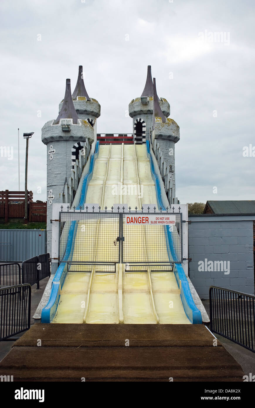 Closed down, deserted funfair rides out of season on Littlehampton ...