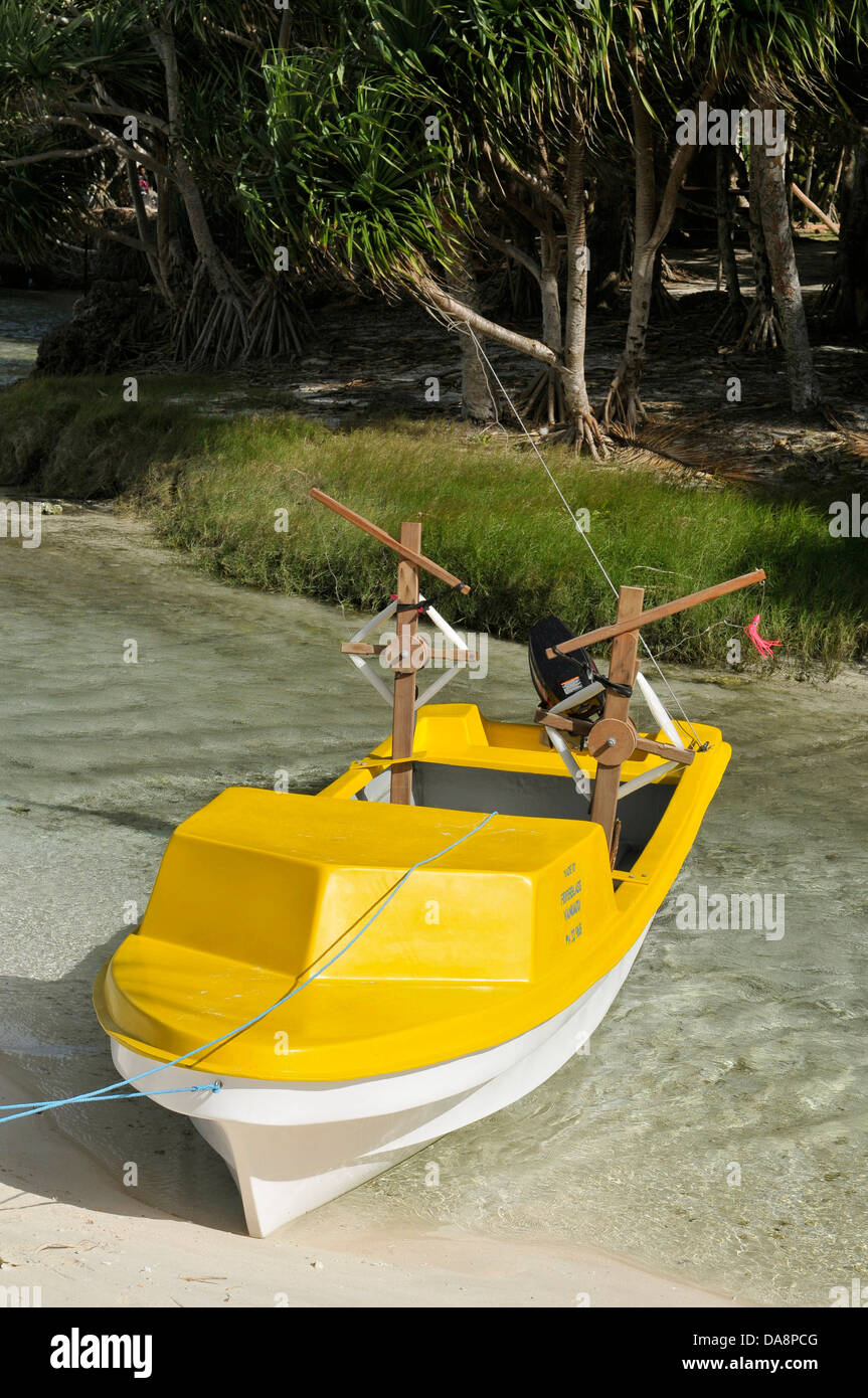 Fishing boat moored in shallow tidal stream Stock Photo - Alamy