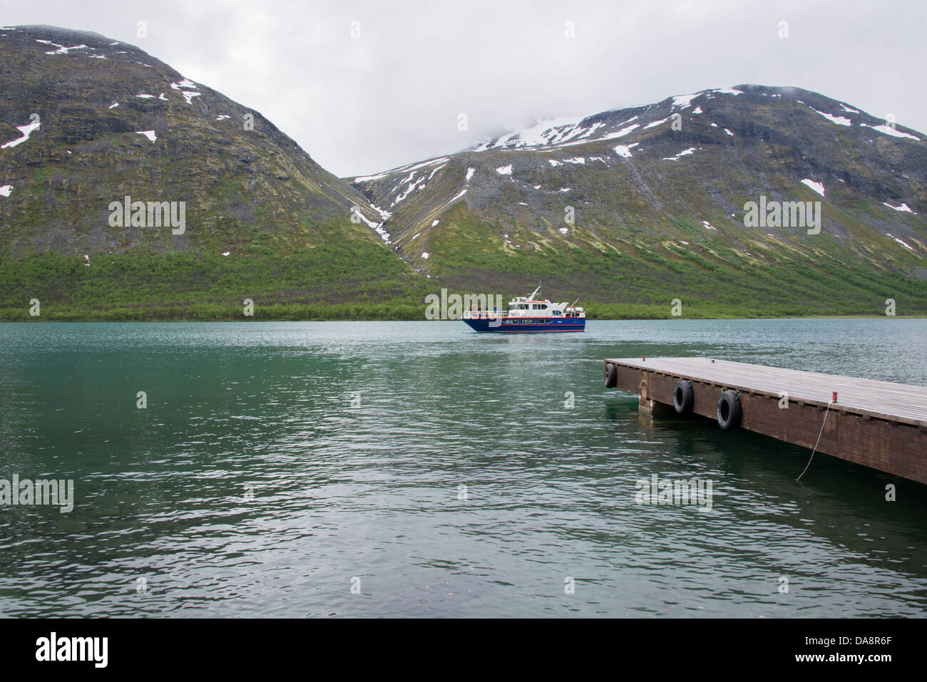 The Gjende transport boat on the Gjende lake in Jotunheimen leaving ...
