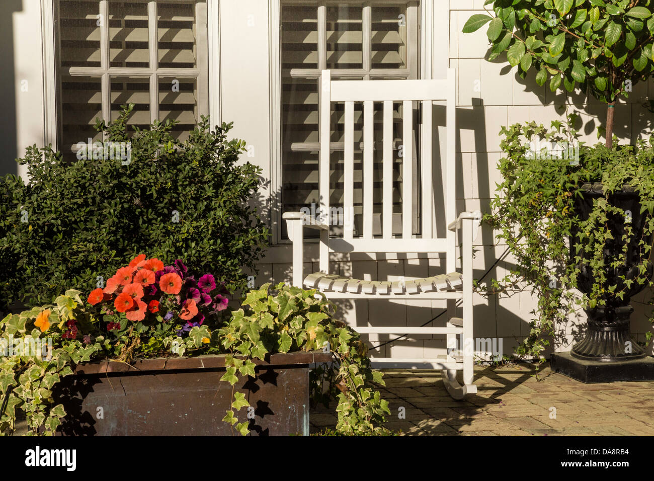 Rocking Chair and Flowers on Front Porch, NC, USA Stock Photo - Alamy