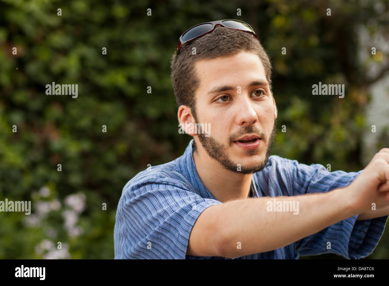 Handsome young man talking in a terrace outdoors Stock Photo - Alamy