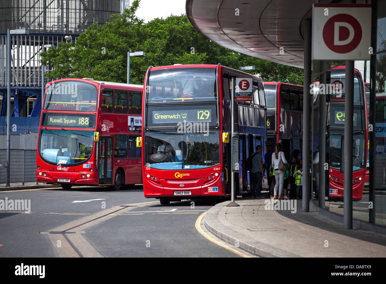 Red london buses transport interchange hi-res stock photography and ...